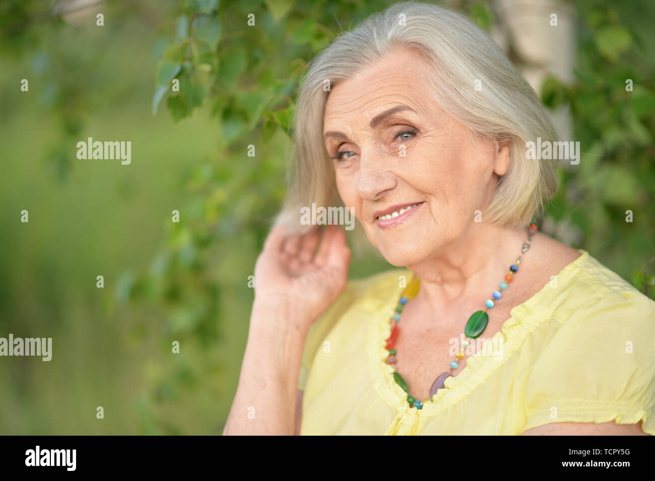 Portrait of happy smiling senior beautiful woman Stock Photo - Alamy