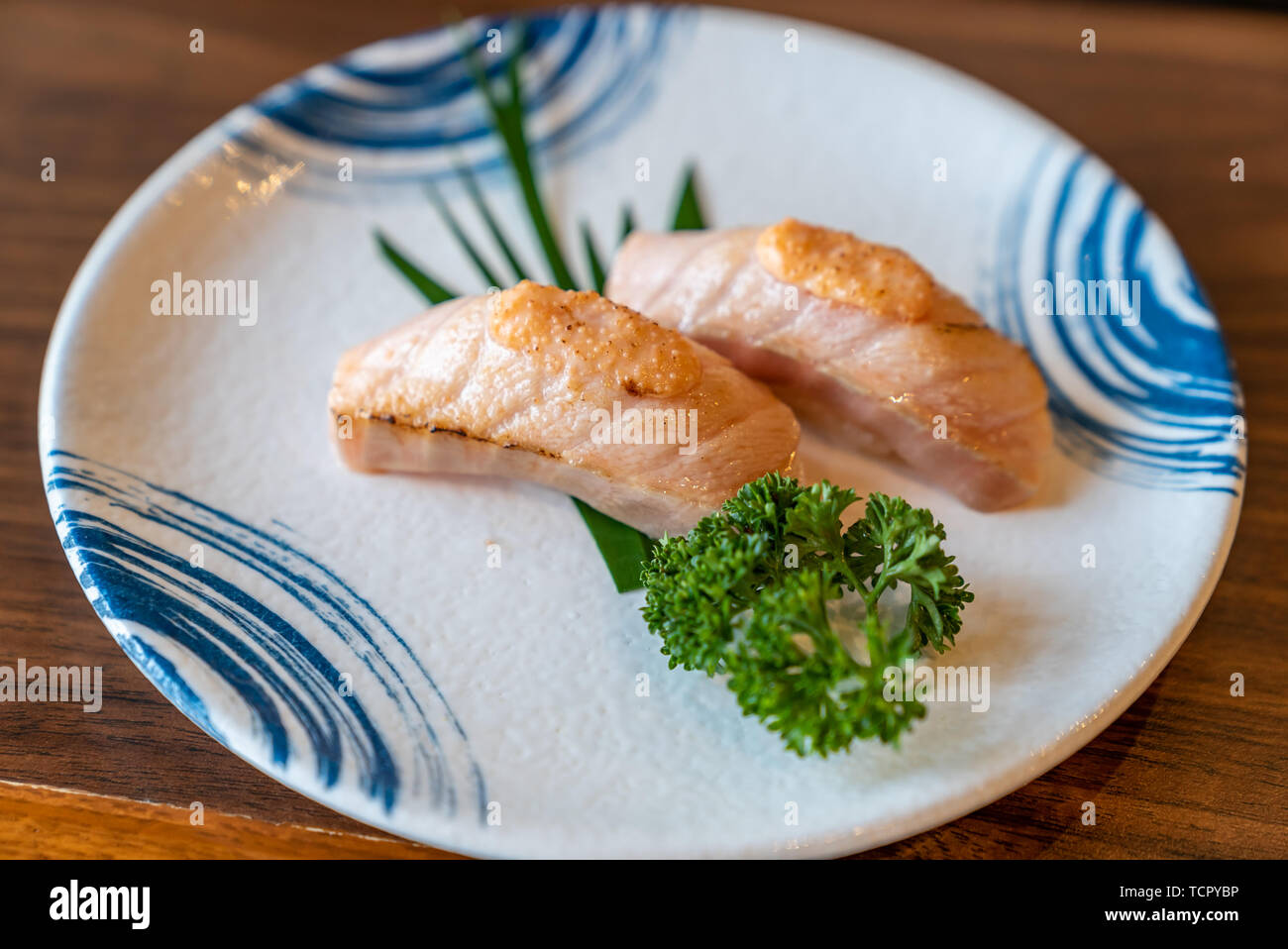 Burn Flaming Salmon Sushi in Traditional Japanese style plate Stock ...