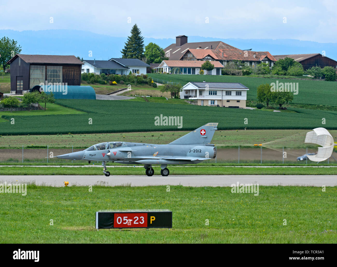 Vintage fighter jet Mirage III landing with a drag parachute, Swiss Air ...