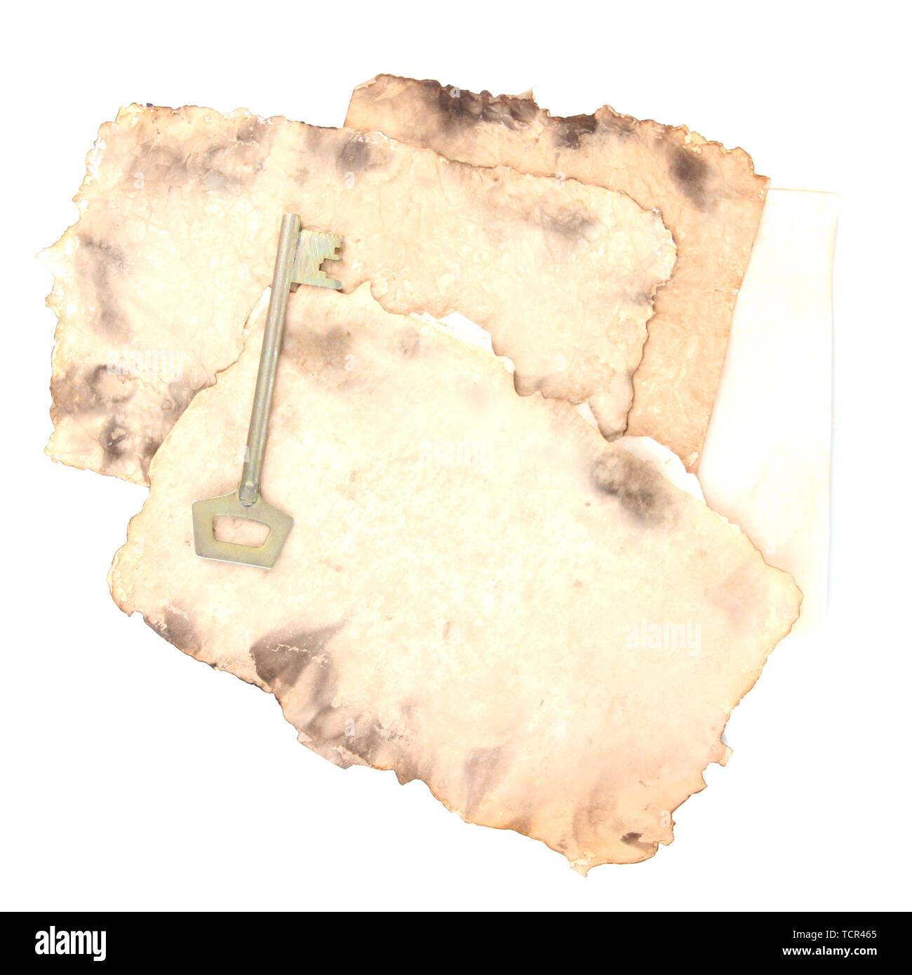 Old paper with key isolated on white Stock Photo - Alamy
