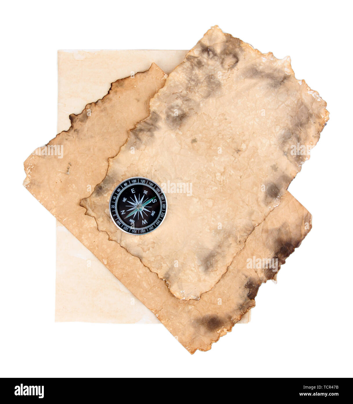 Old paper with compass isolated on white Stock Photo - Alamy