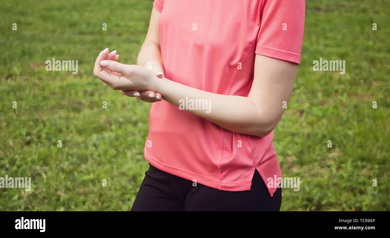 Medicine health care. Young sporty female wearing pink training t-shirt ...