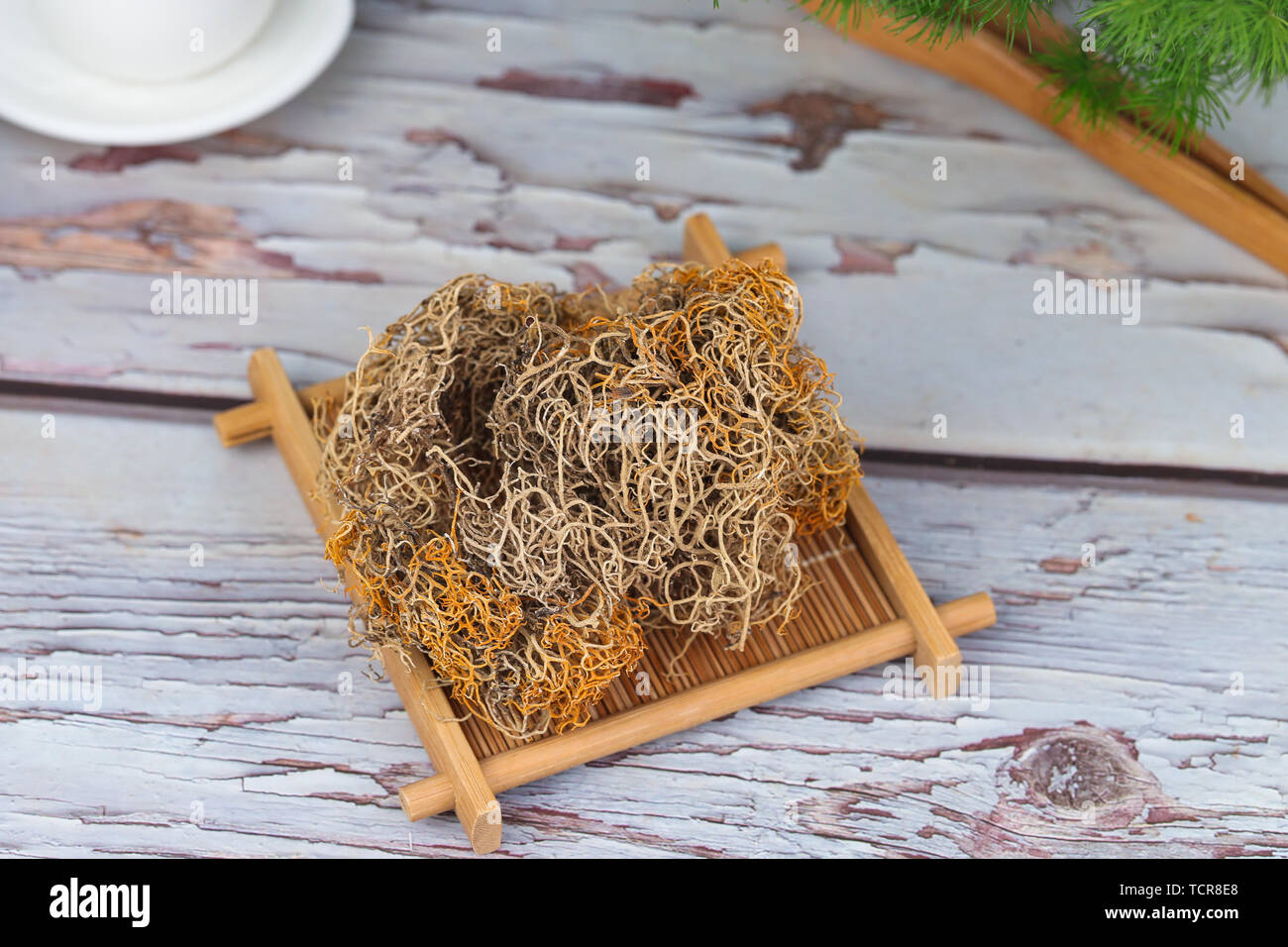 Black snow tea Stock Photo - Alamy