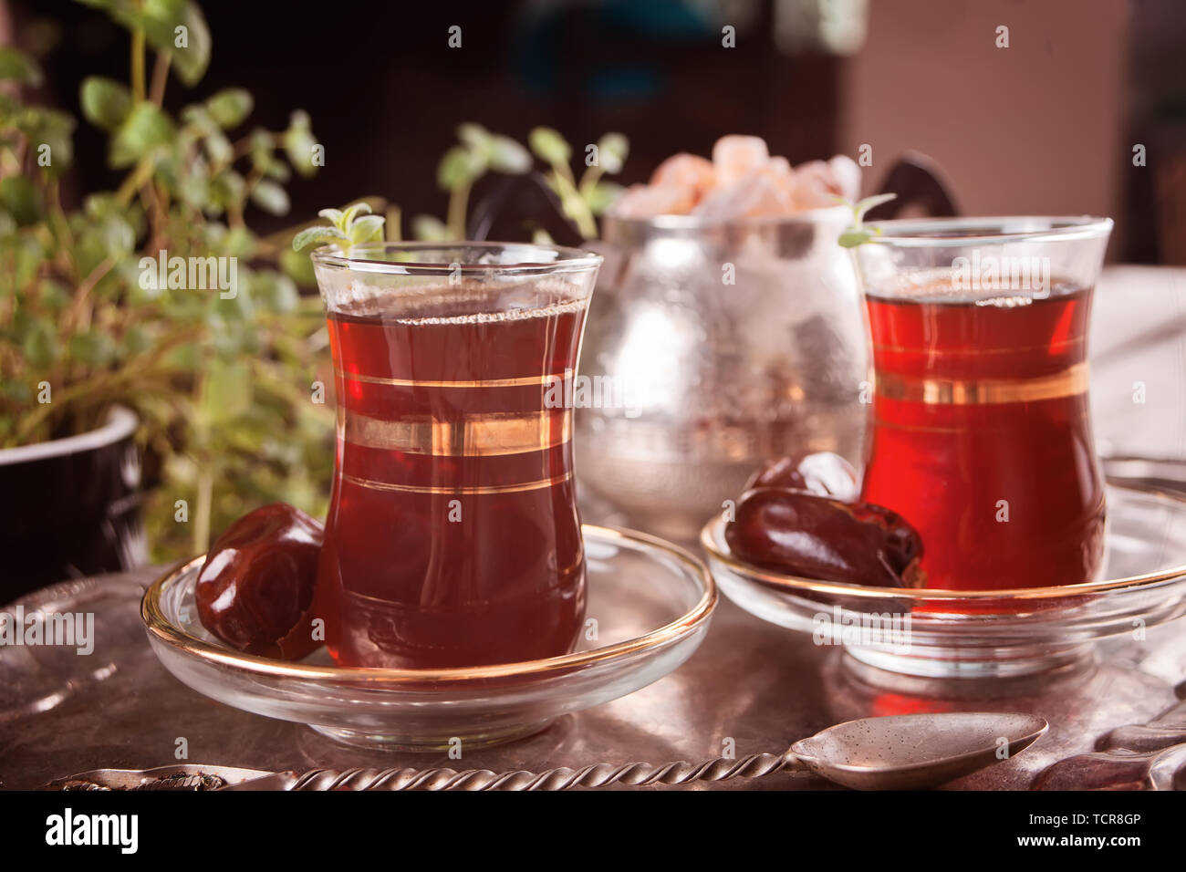 Turkish tea in traditional glass cups on the metal tray. Oriental Stock ...