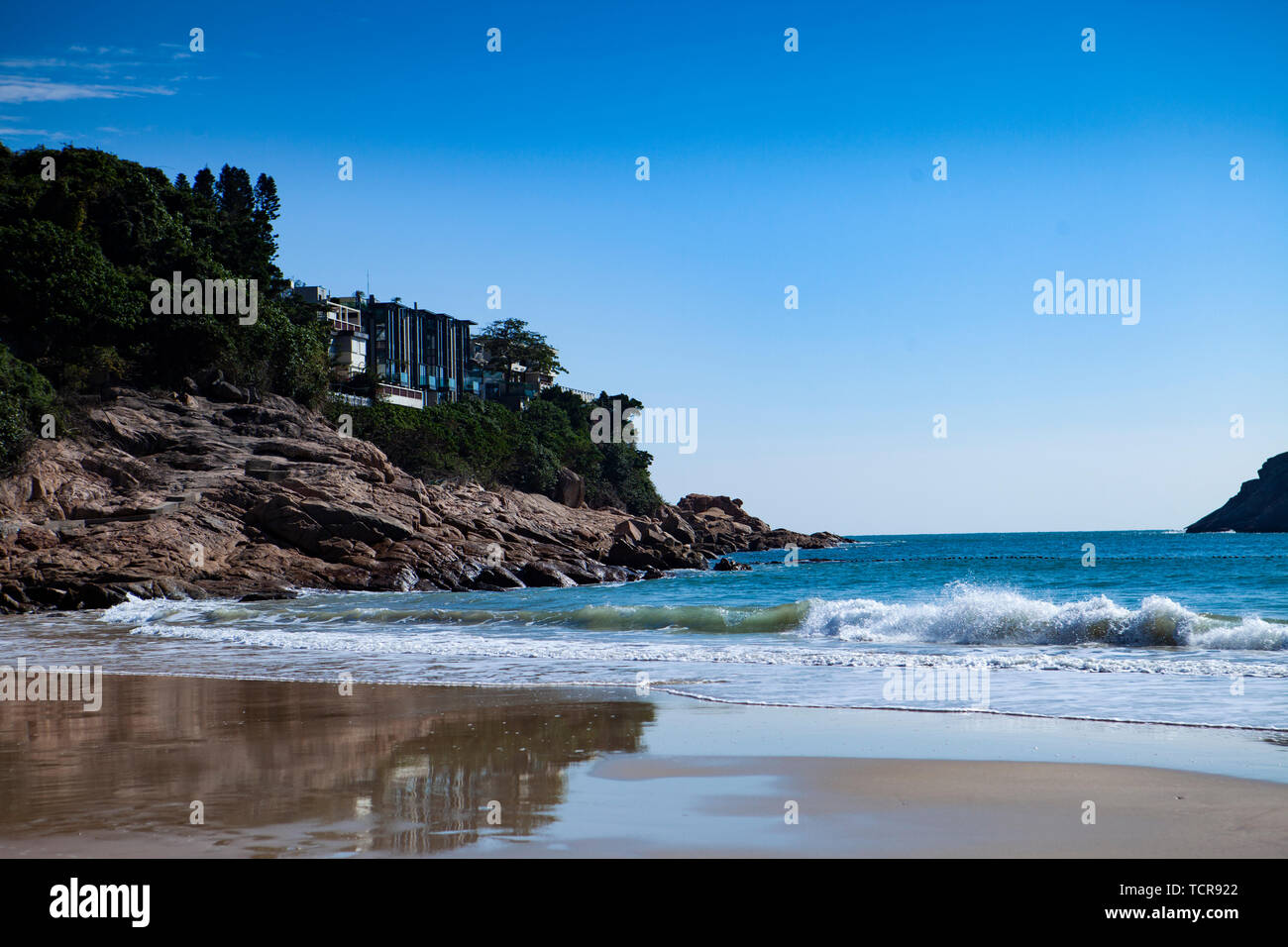 Shek O, Hong Kong, a Mediterranean-style town with a blue sea and white ...