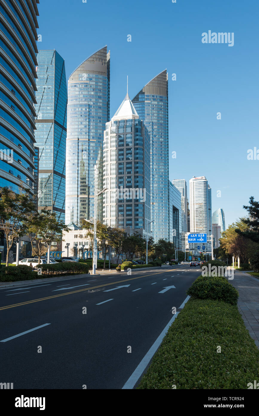 City building facade with street Stock Photo - Alamy