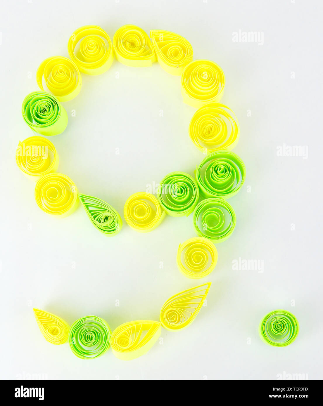 The digit 9 is made of quilling isolated on white Stock Photo - Alamy