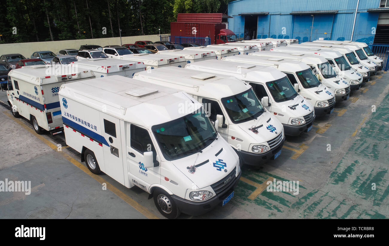 Shanghai security escort vehicle Stock Photo - Alamy