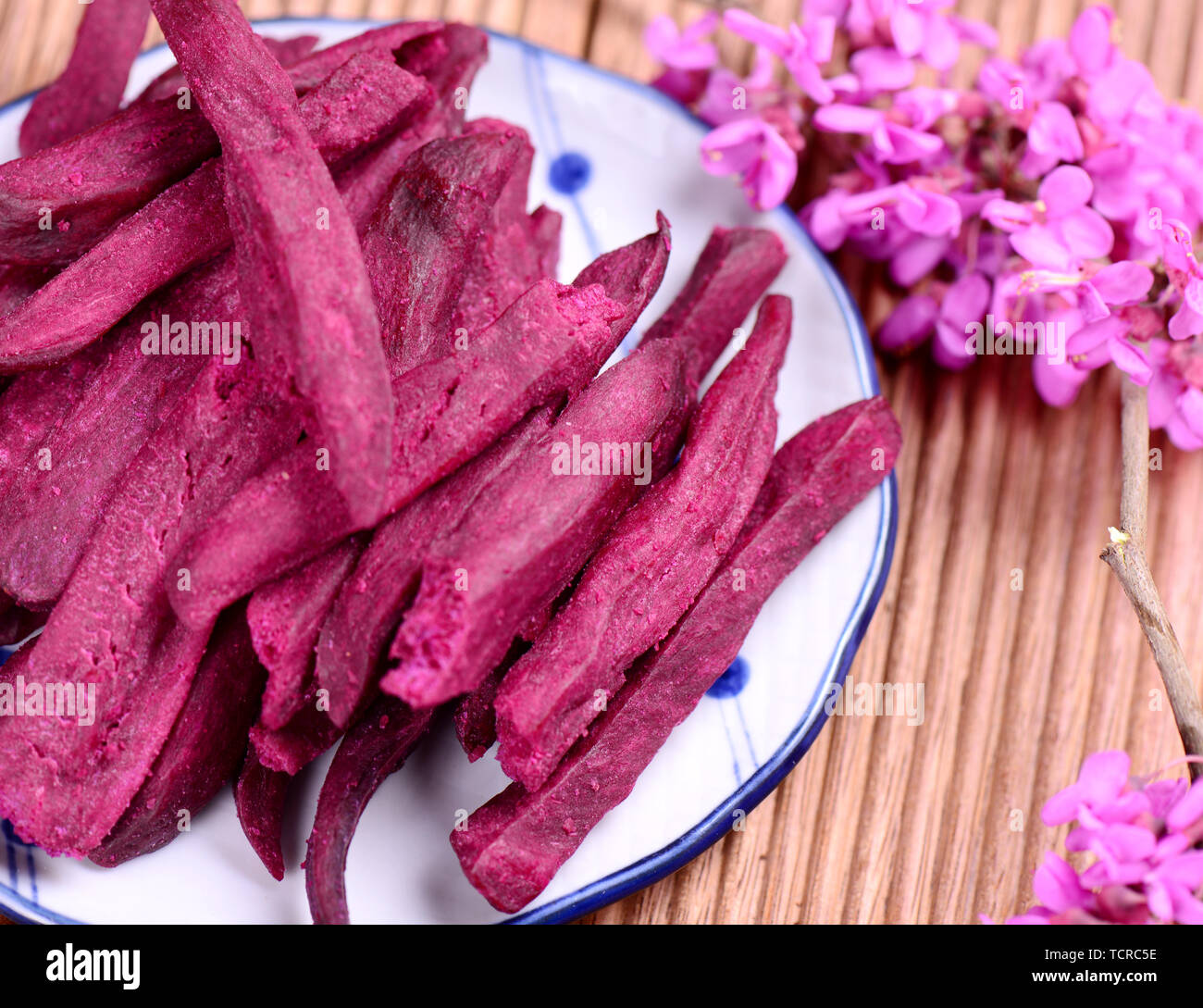 Purple potato dried purple potato strips Stock Photo - Alamy