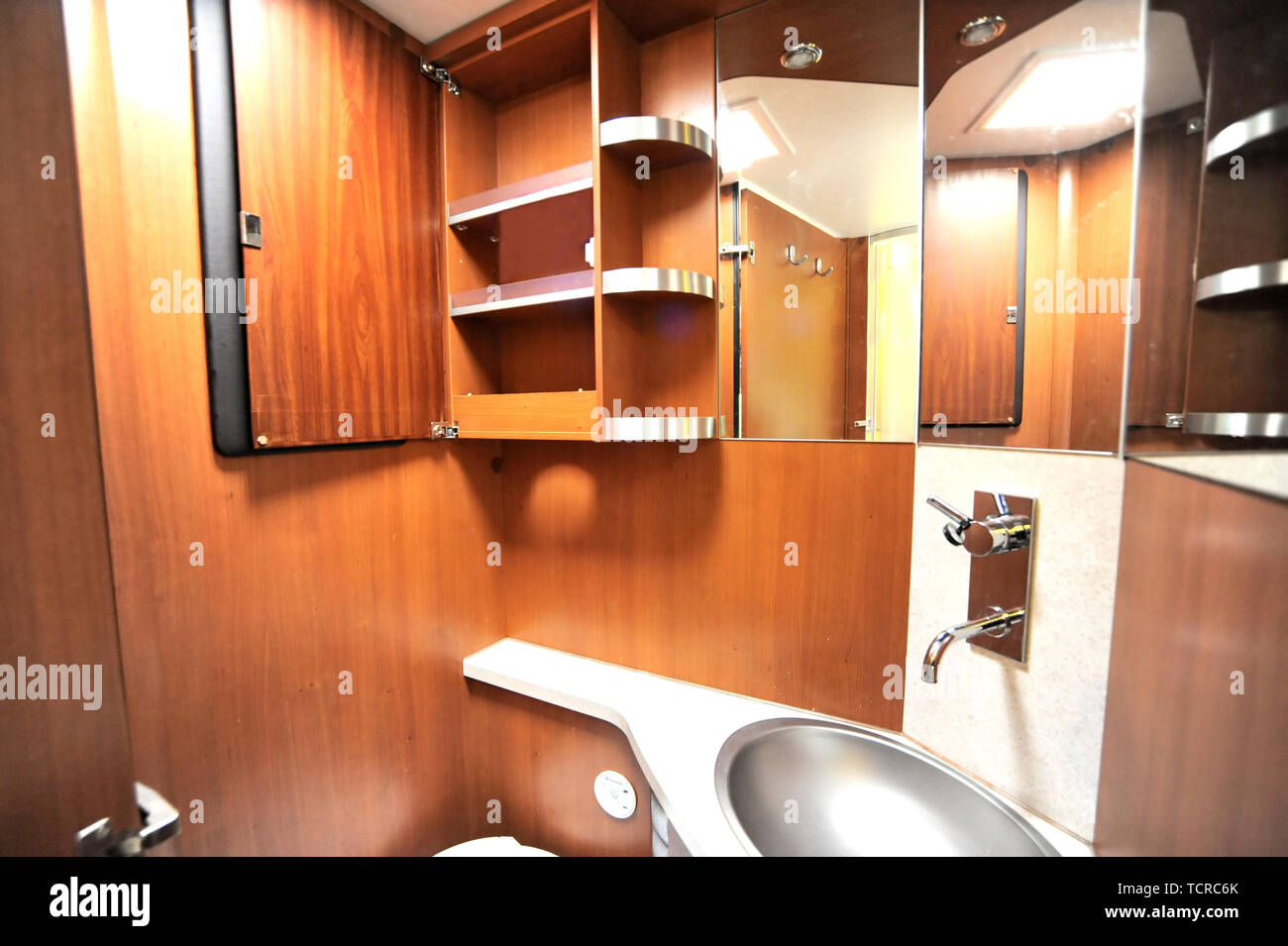 Inside of RV with washroom sink and wardrobe Stock Photo - Alamy