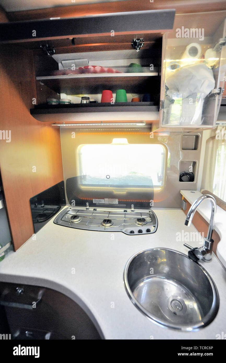 Interior shot of kitchen in recreation vehicle Stock Photo - Alamy