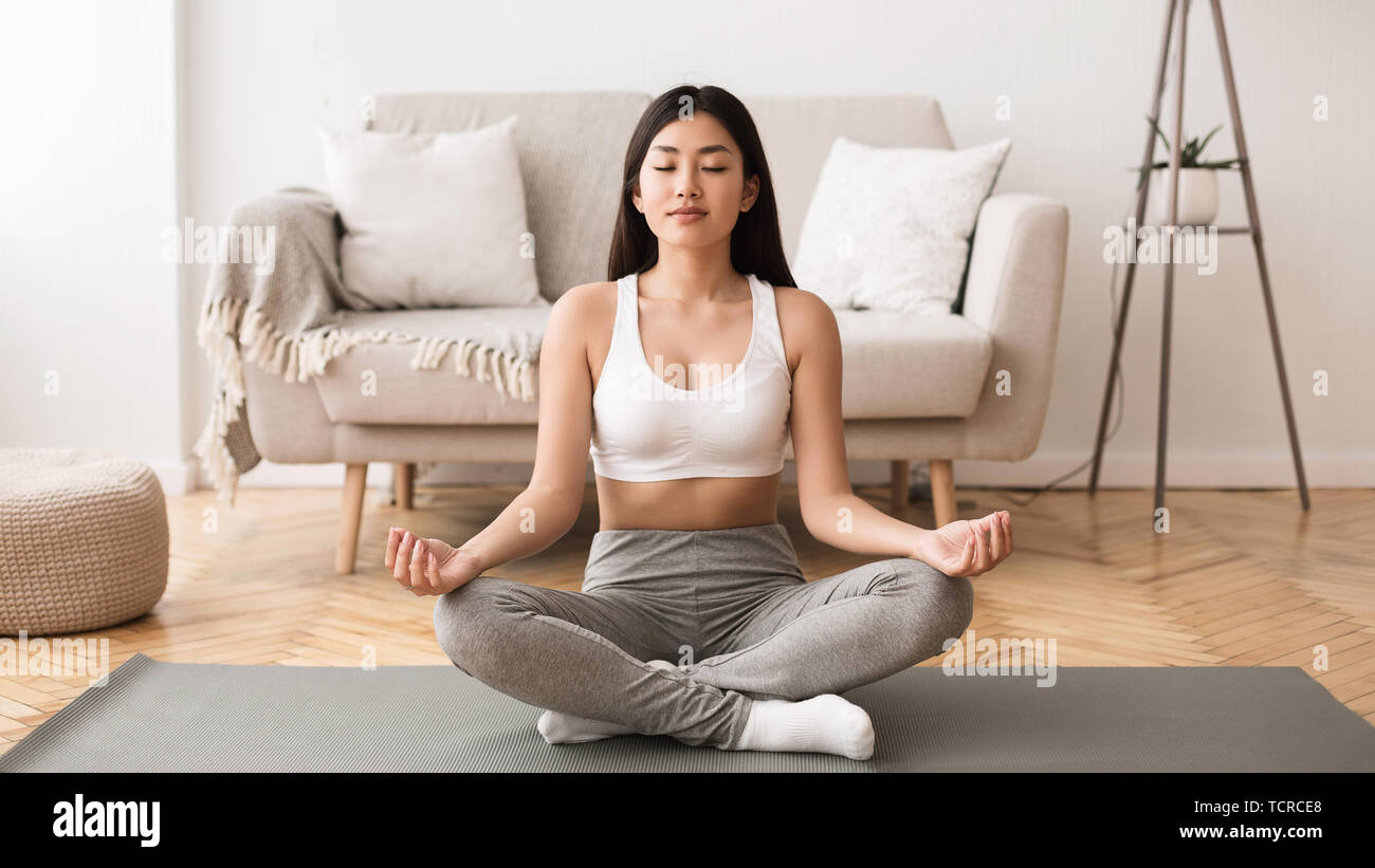 Morning Fitness Teen Girl Meditating On Mat At Home Stock Photo Alamy morning-fitness-teen-girl-meditating-on-mat-at-home-stock-photo-alamy