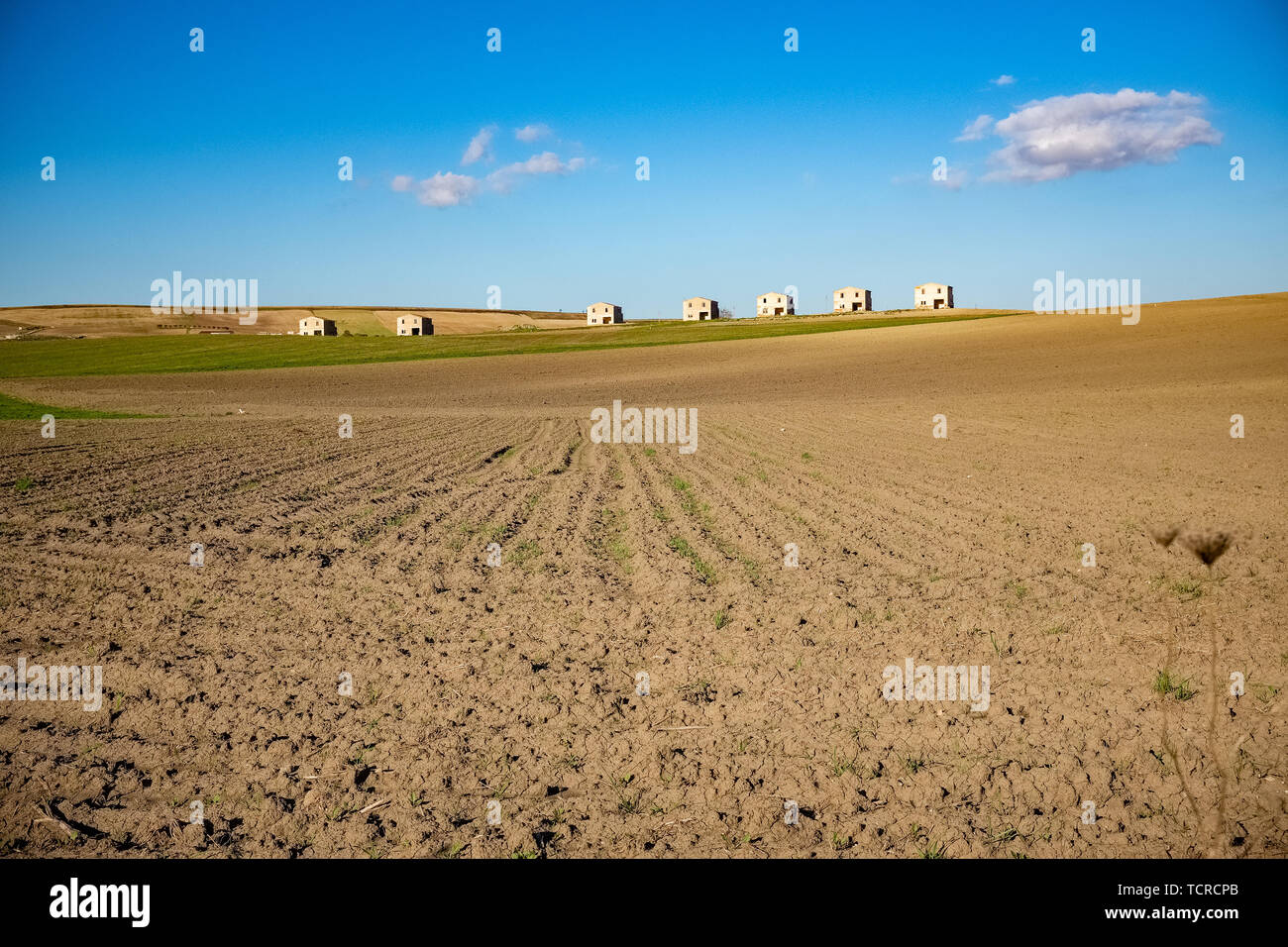 Agricultural landscape of Murgia plateau with abandoned farmhouses in ...