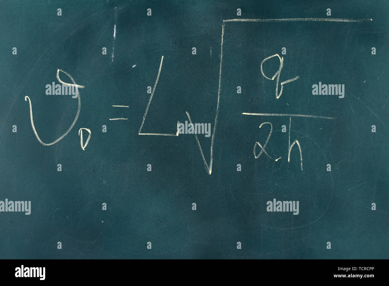Physics formula written on blackboard with chalk Stock Photo - Alamy