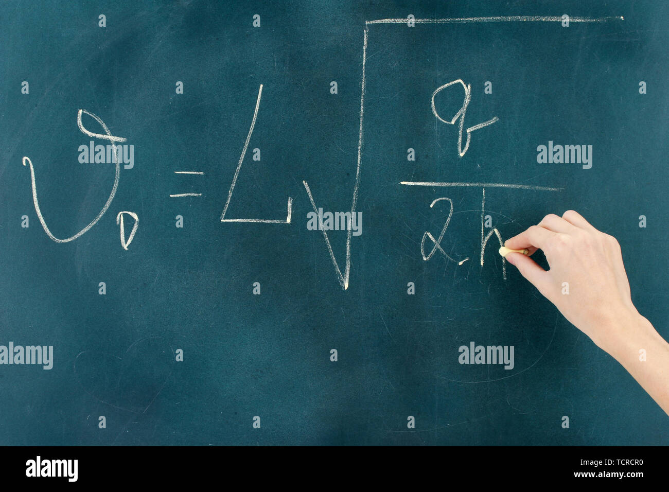 Physics formula written on blackboard with chalk Stock Photo - Alamy