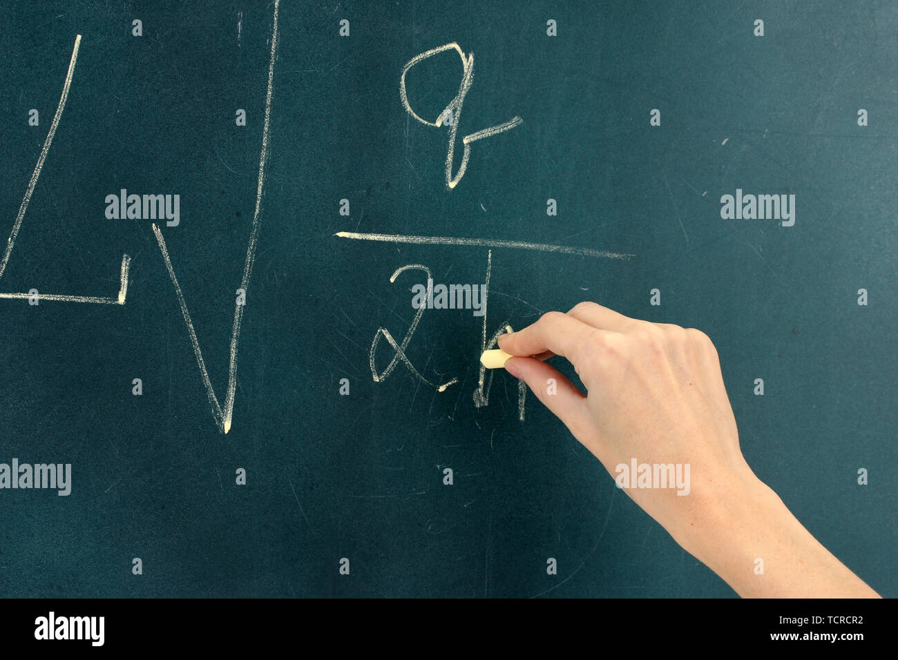 Physics formula written on blackboard with chalk Stock Photo - Alamy