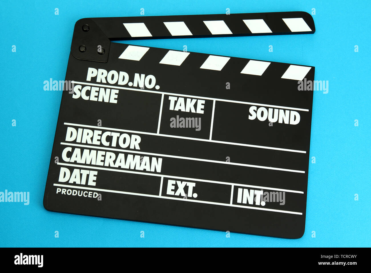 Movie production clapper board on color background Stock Photo - Alamy