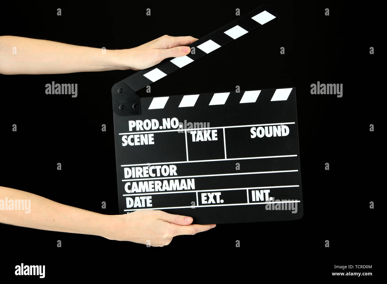 Movie production clapper board isolated on black Stock Photo - Alamy
