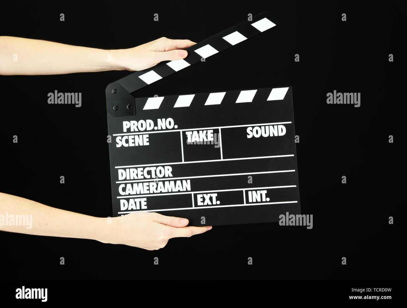 Movie production clapper board isolated on black Stock Photo - Alamy