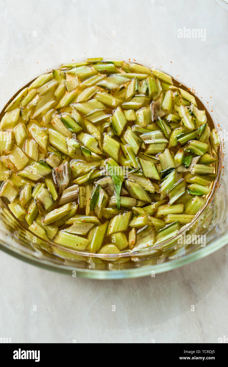 Marinated Chard Root Pickles in Water Cut Diagonal in Glass Bowl ...