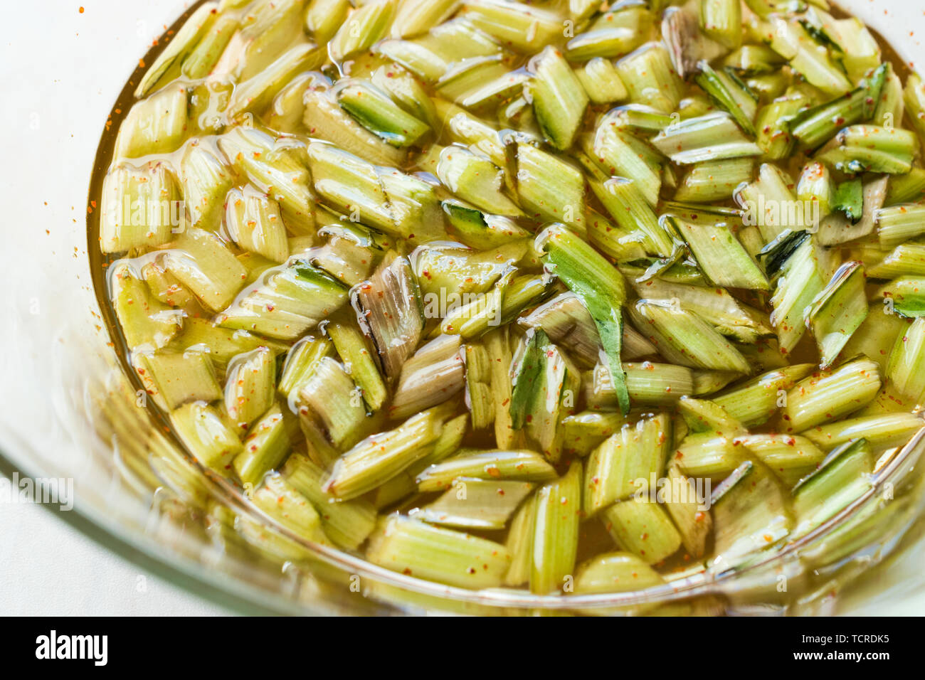 Marinated Chard Root Pickles in Water Cut Diagonal in Glass Bowl ...
