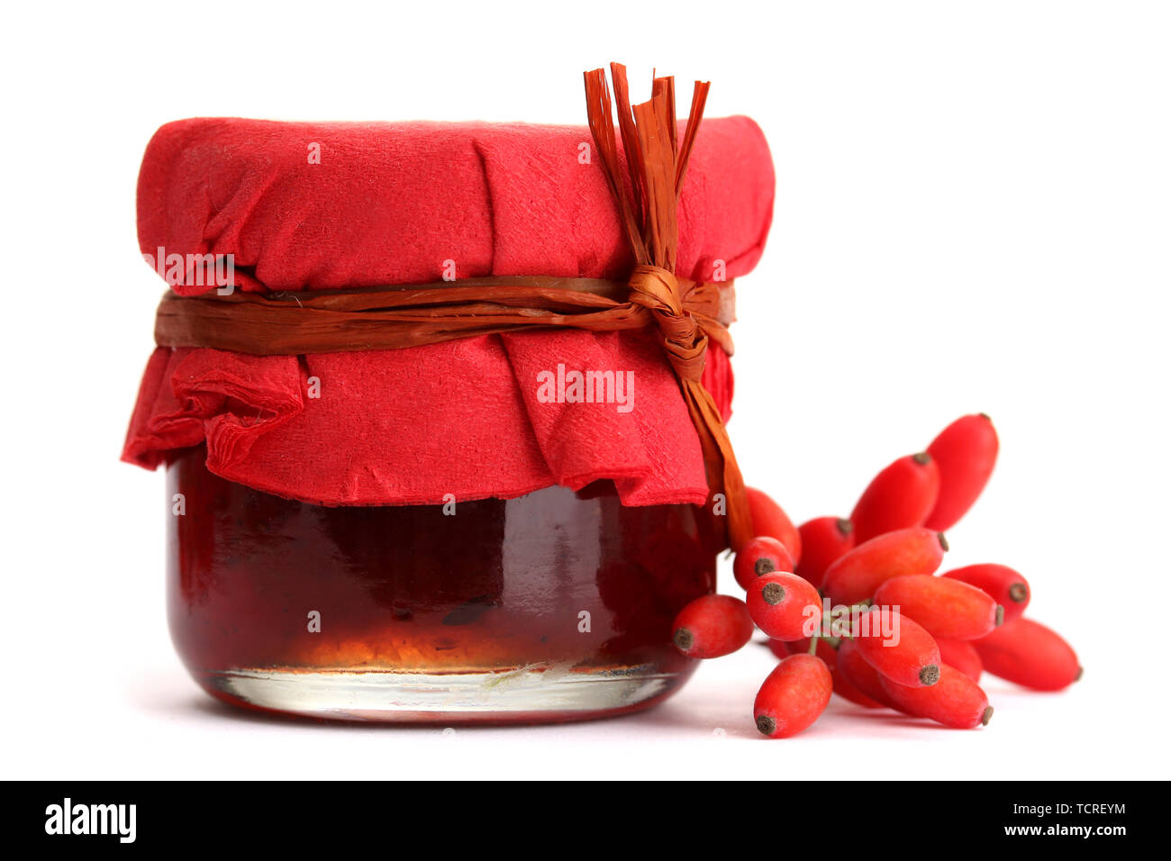 ripe barberries and jar of jam isolated white Stock Photo - Alamy