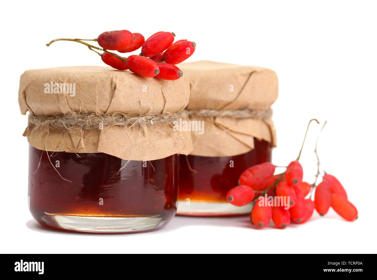 ripe barberries and jars of jam isolated white Stock Photo - Alamy