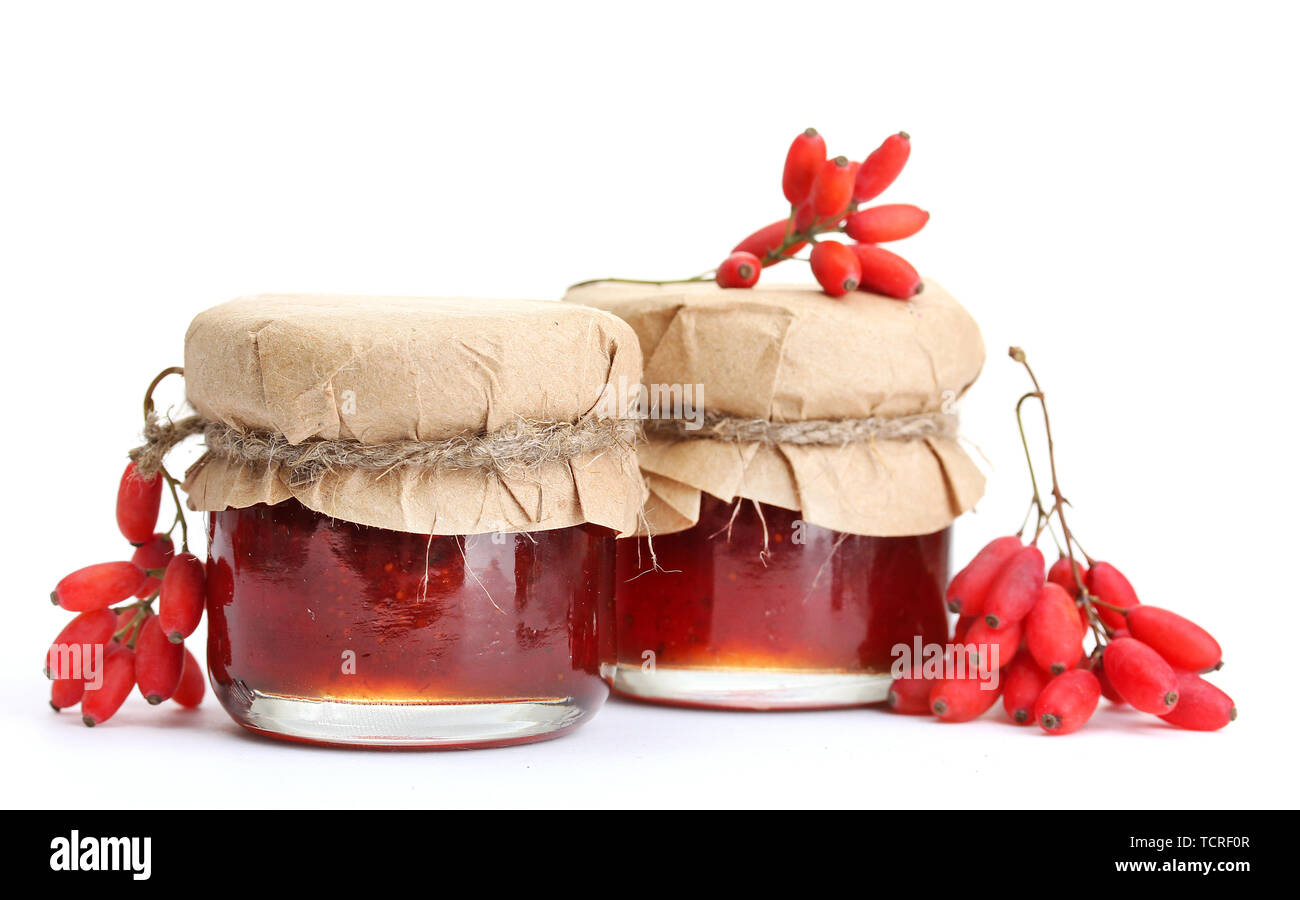 ripe barberries and jars of jam isolated white Stock Photo - Alamy