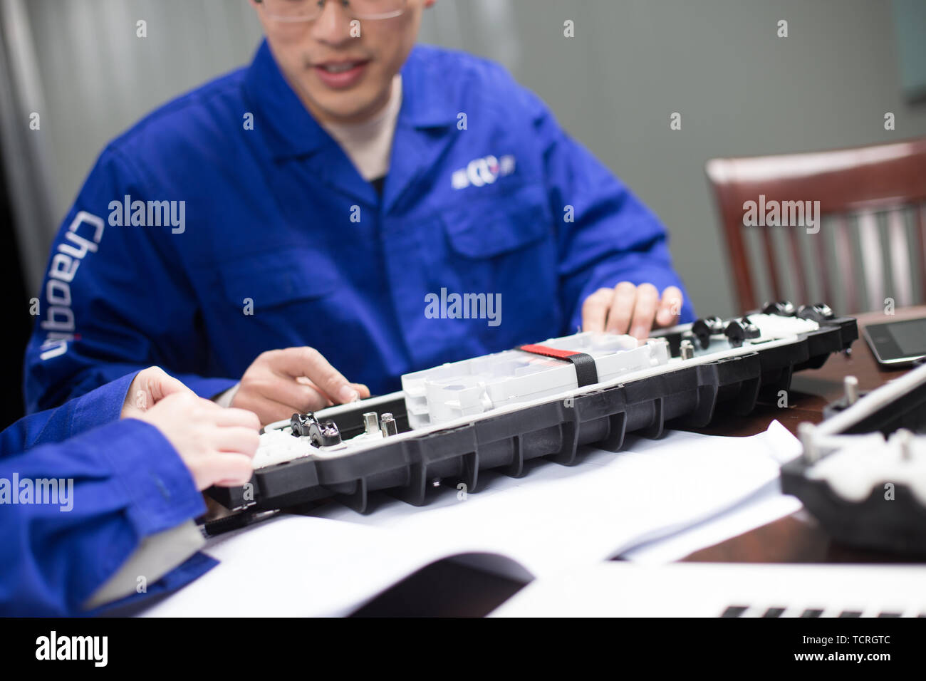 People choose ching product in factory Stock Photo - Alamy