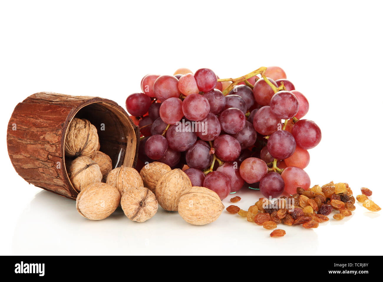 Grape with nuts isolated on white Stock Photo - Alamy