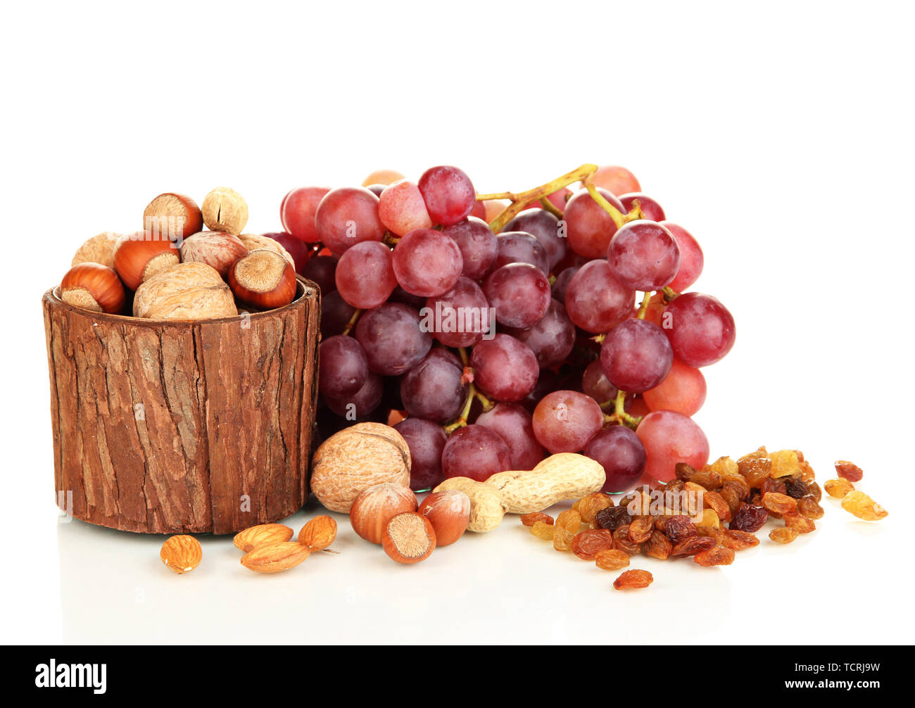 Grape with nuts isolated on white Stock Photo - Alamy