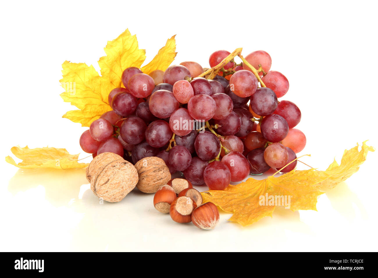 Grape with nuts isolated on white Stock Photo - Alamy