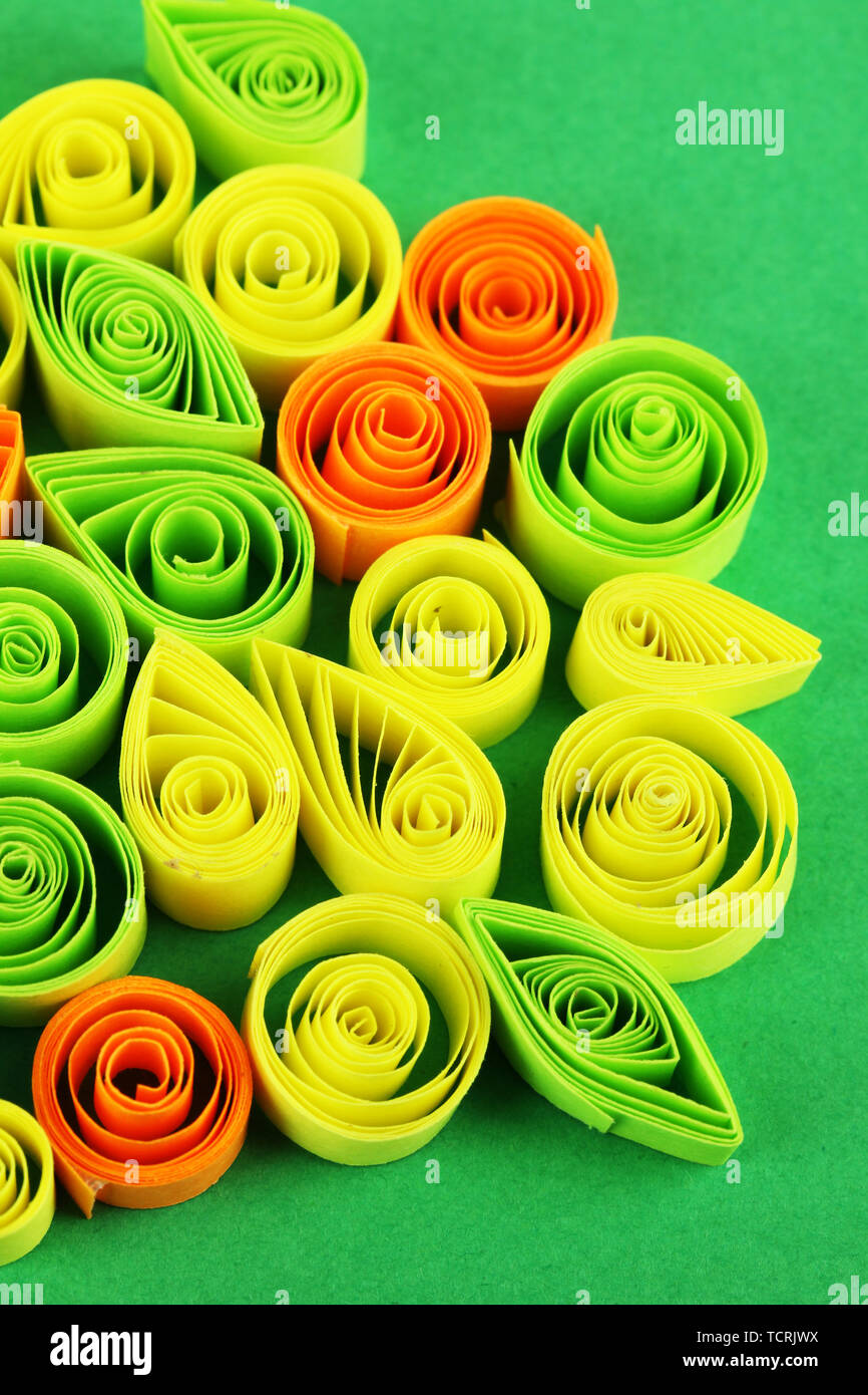 Colorful quilling on blue background close-up Stock Photo - Alamy