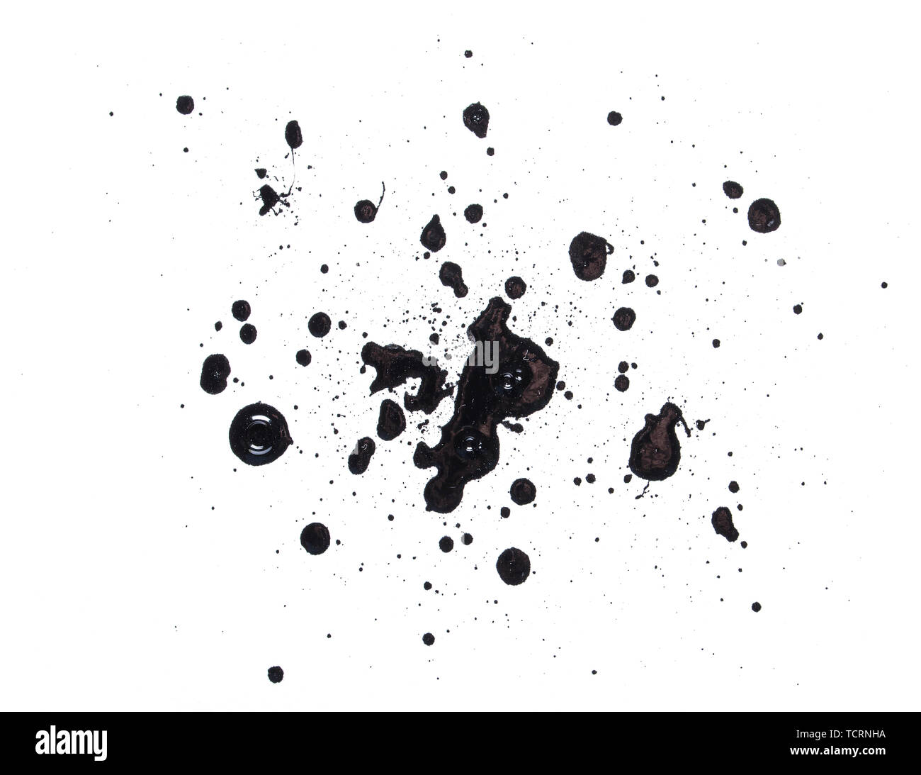 Black splatter paint isolated on white paper background Stock Photo - Alamy