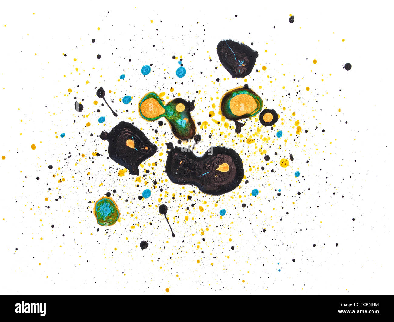 Splatter flow paint isolated on white background made with gold, blue ...