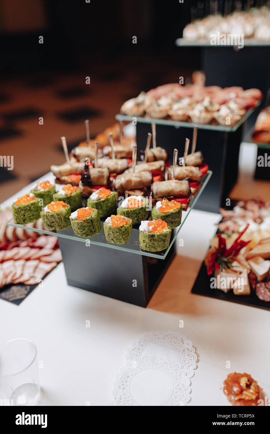 delicious festive buffet with canapés and different delicious meals ...