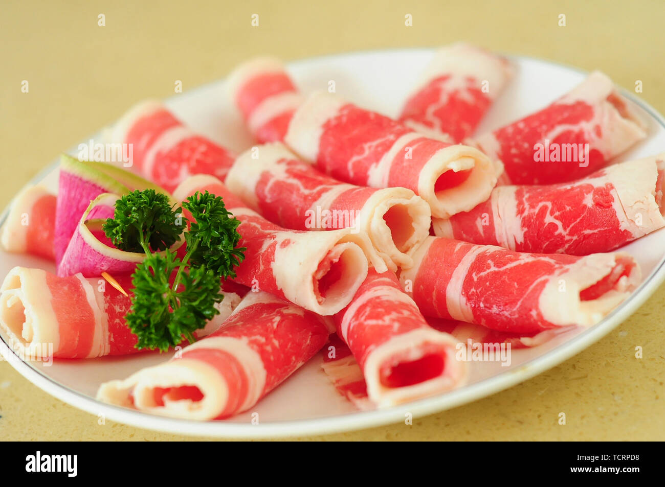 Fat cow roll, fat sheep roll Stock Photo - Alamy