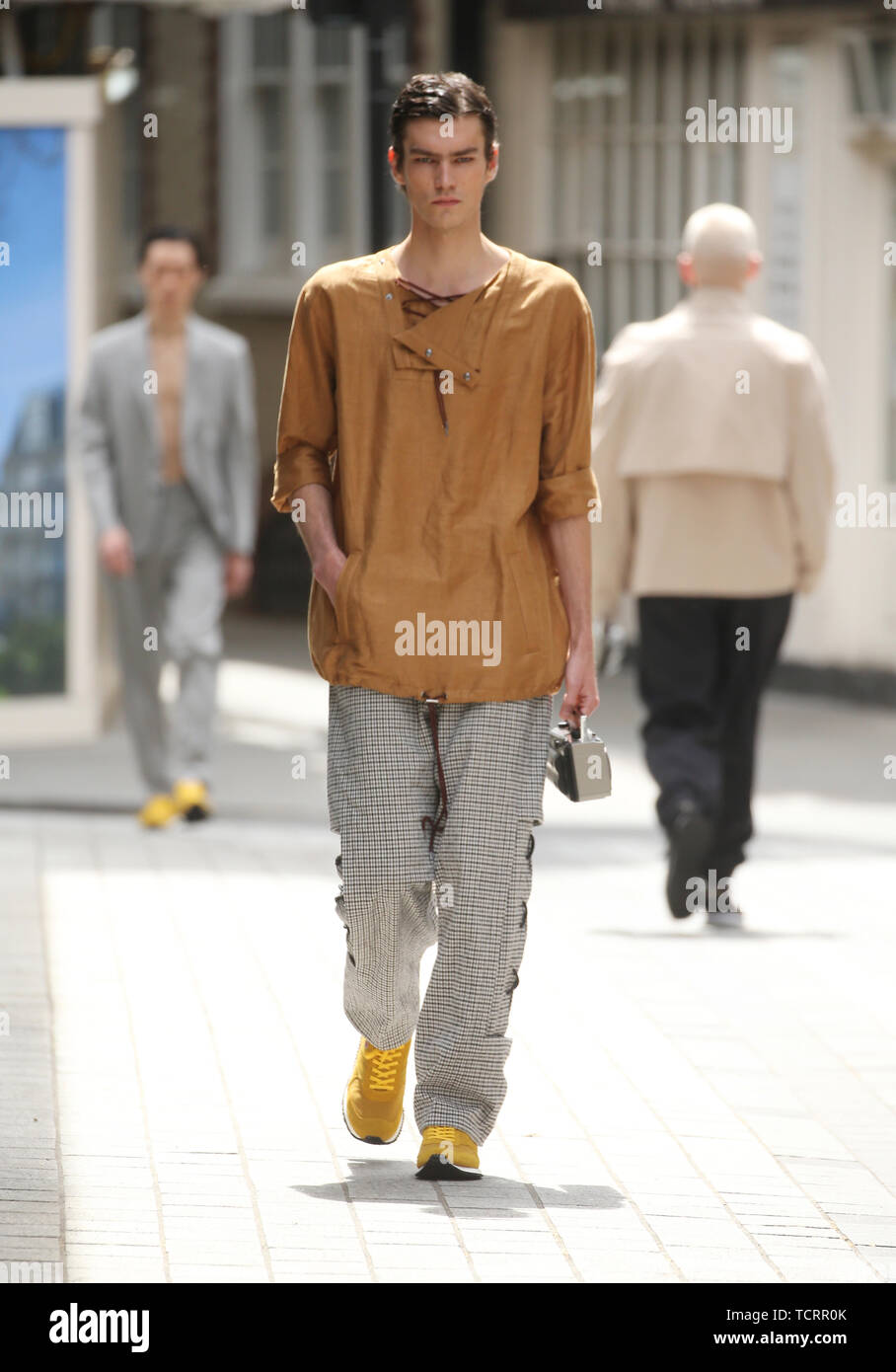 Models on the catwalk during the Chalayan London Fashion Week Men's ...