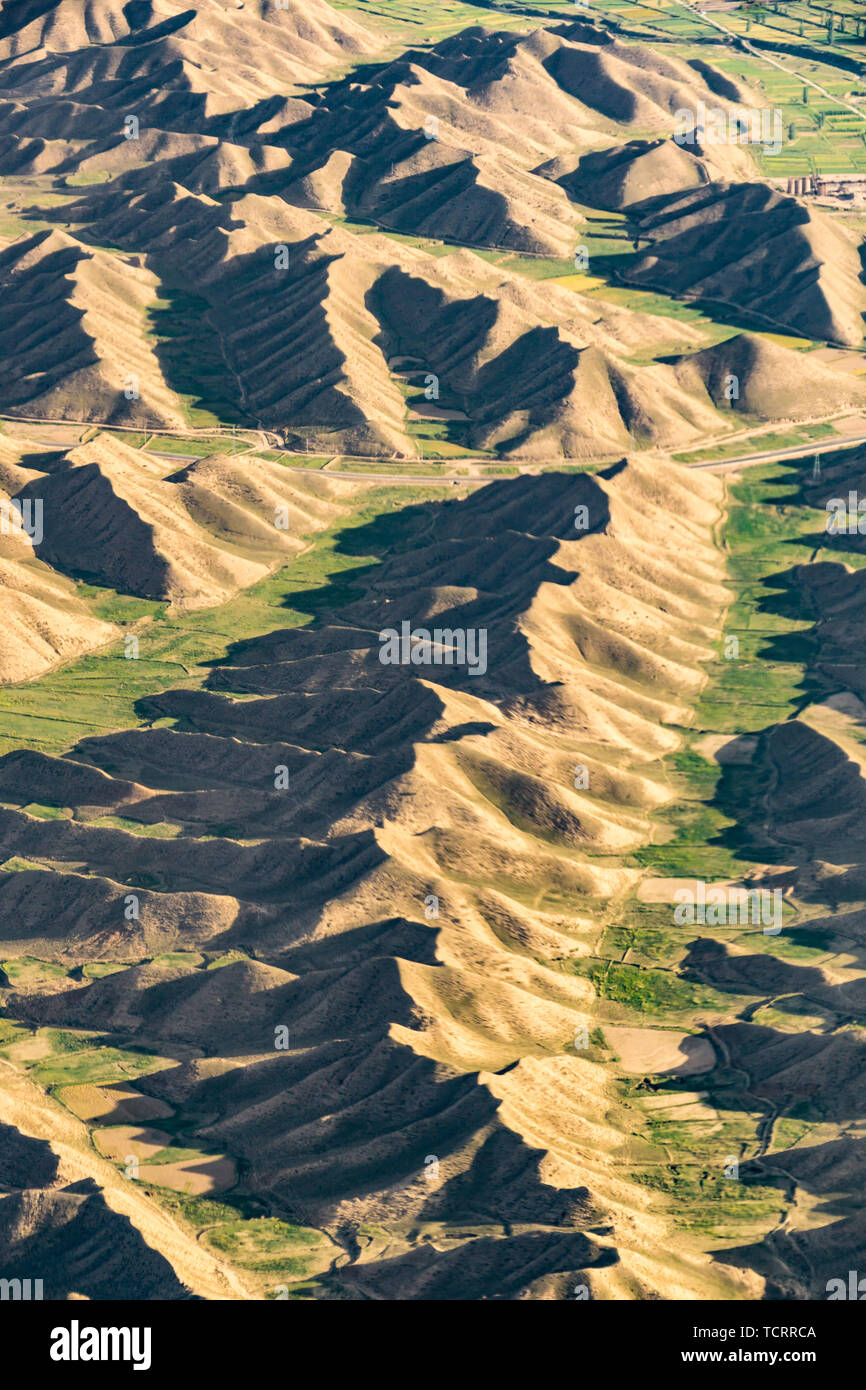 Aerial shooting plateau mountains, mountains, snow mountains Stock ...