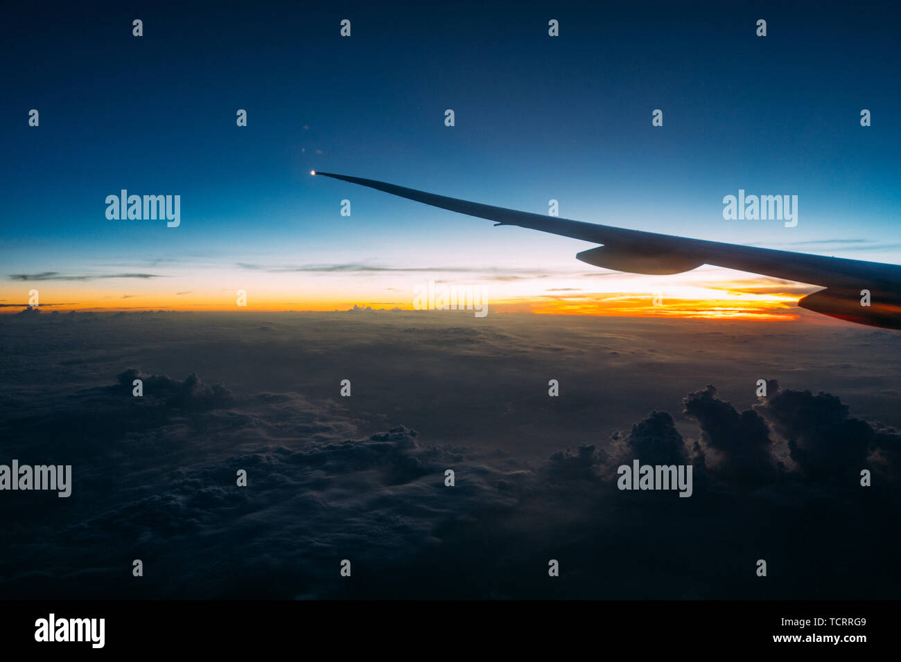 Aircraft flying at high altitude Stock Photo - Alamy