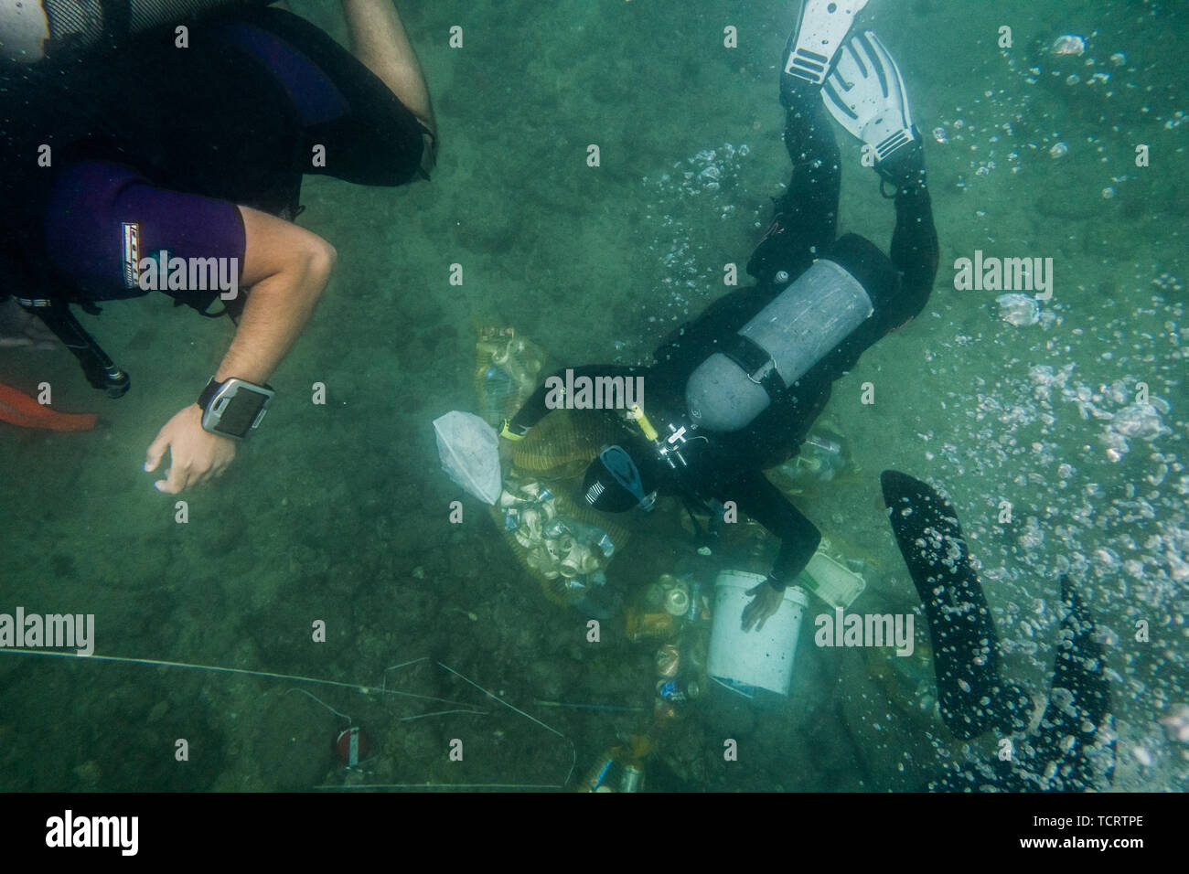 Calypso Dive Club members clear trash from the sea along Beirut's ...