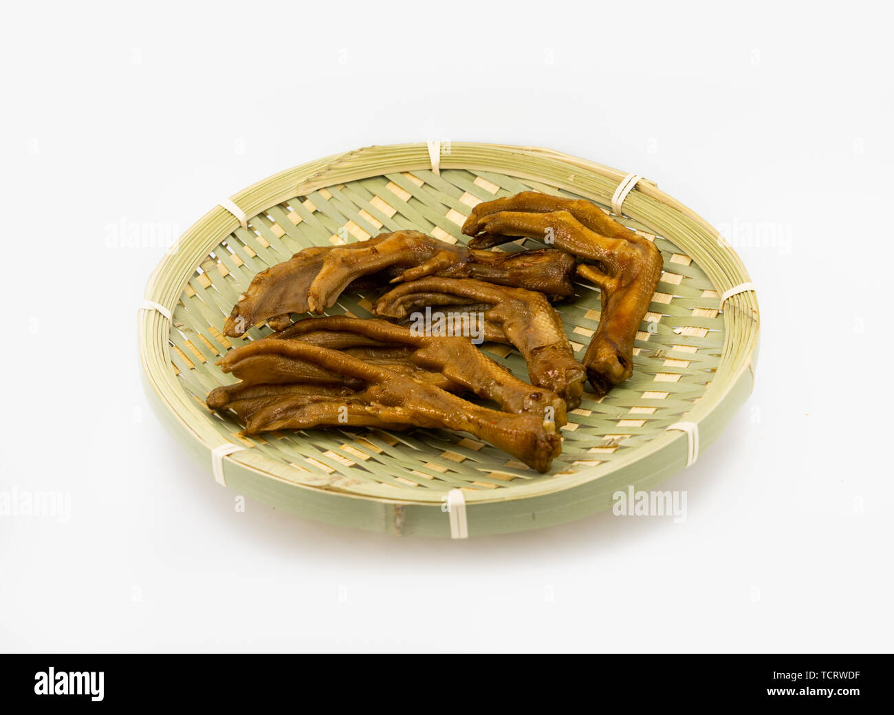 The halogen duck claws in the bamboo basket Stock Photo - Alamy
