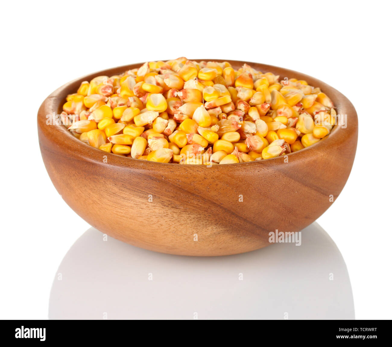 Corn in wooden bowl isolated on white Stock Photo - Alamy
