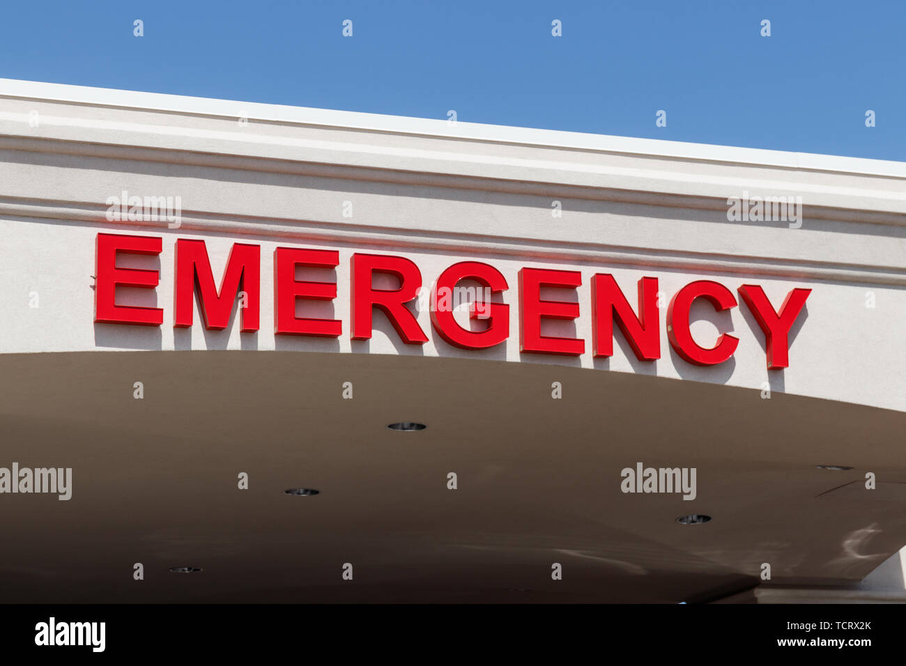 Red Emergency Entrance Sign for a Local Hospital Stock Photo - Alamy
