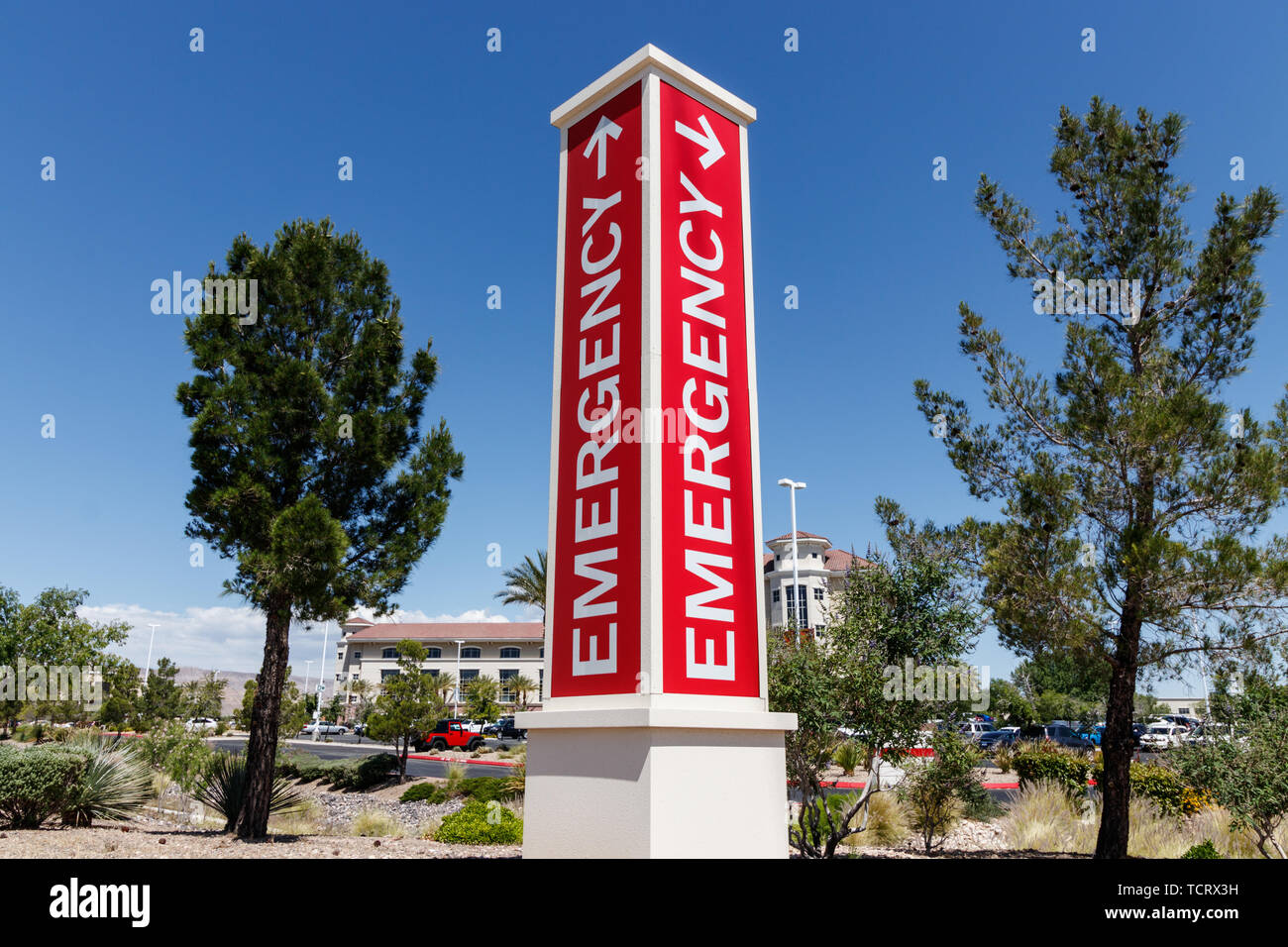 Red Emergency Entrance Sign for a Local Hospital Stock Photo - Alamy