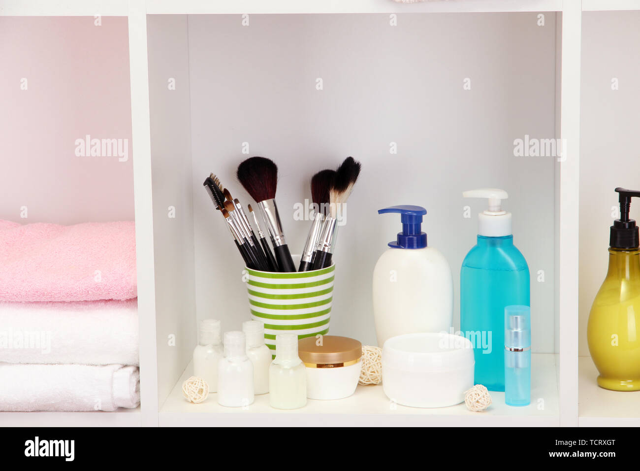 Bath accessories on shelfs in bathroom Stock Photo - Alamy