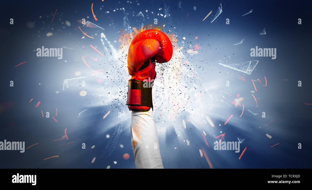 Hand hits strongly and makes fire beam around Stock Photo - Alamy