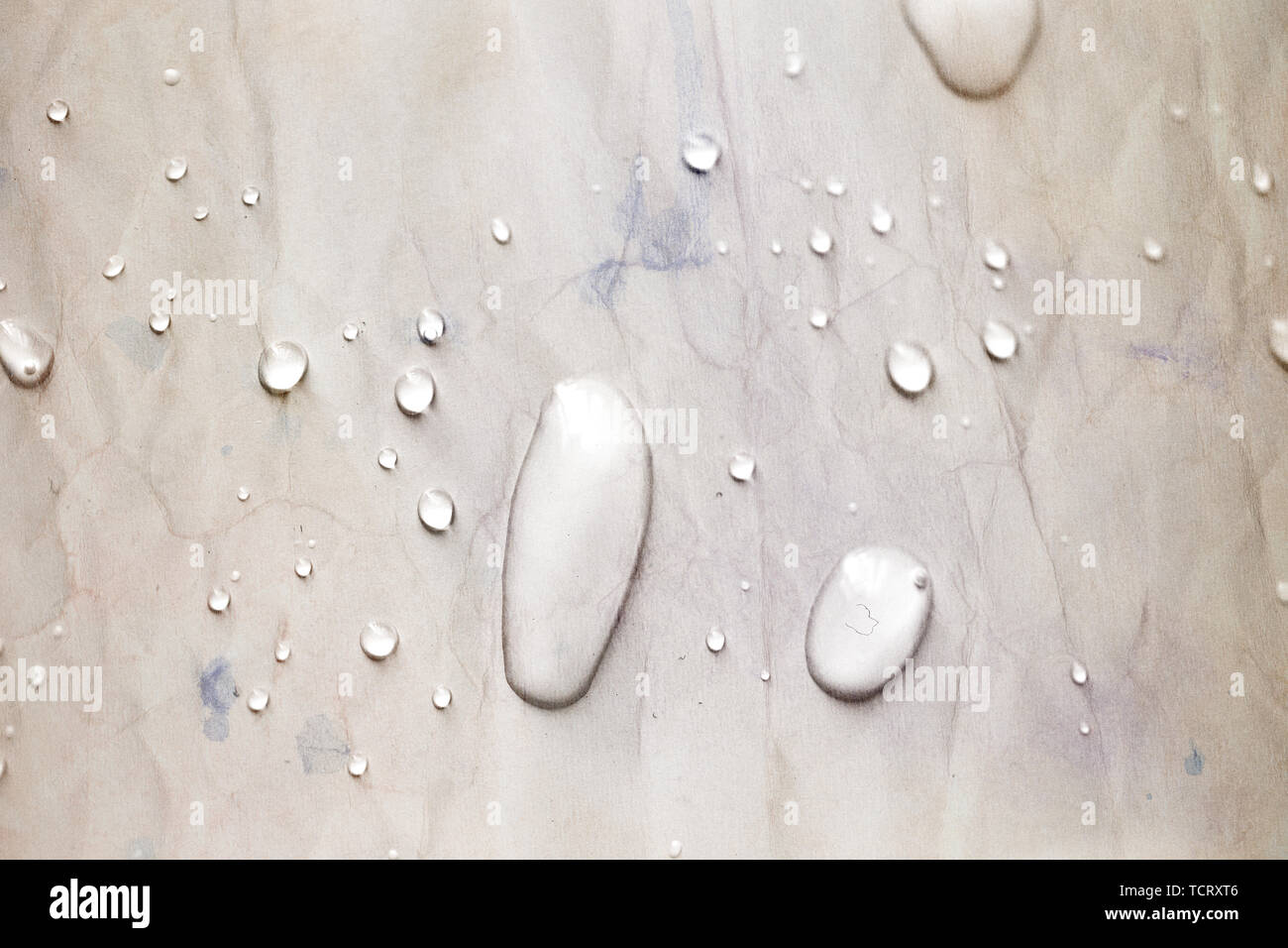 Photo macro background with transparent drops on a retro old bright ...