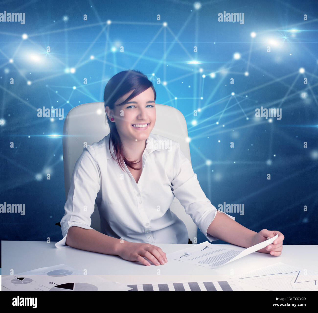 Manager in front of the office desk with networking concept Stock Photo ...