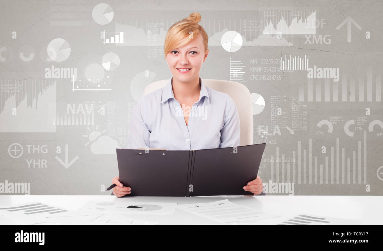 Business person sitting at desk with financial change, and report ...
